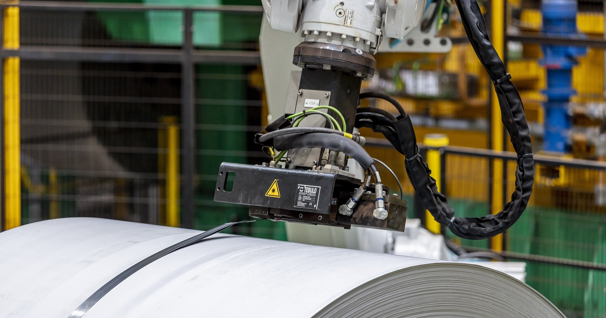 Robotics applications for hot and cold rolling mills and strip ...